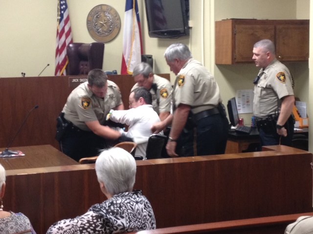 Capital Murder defendant Calvert wheeled, unwilling, into district ...